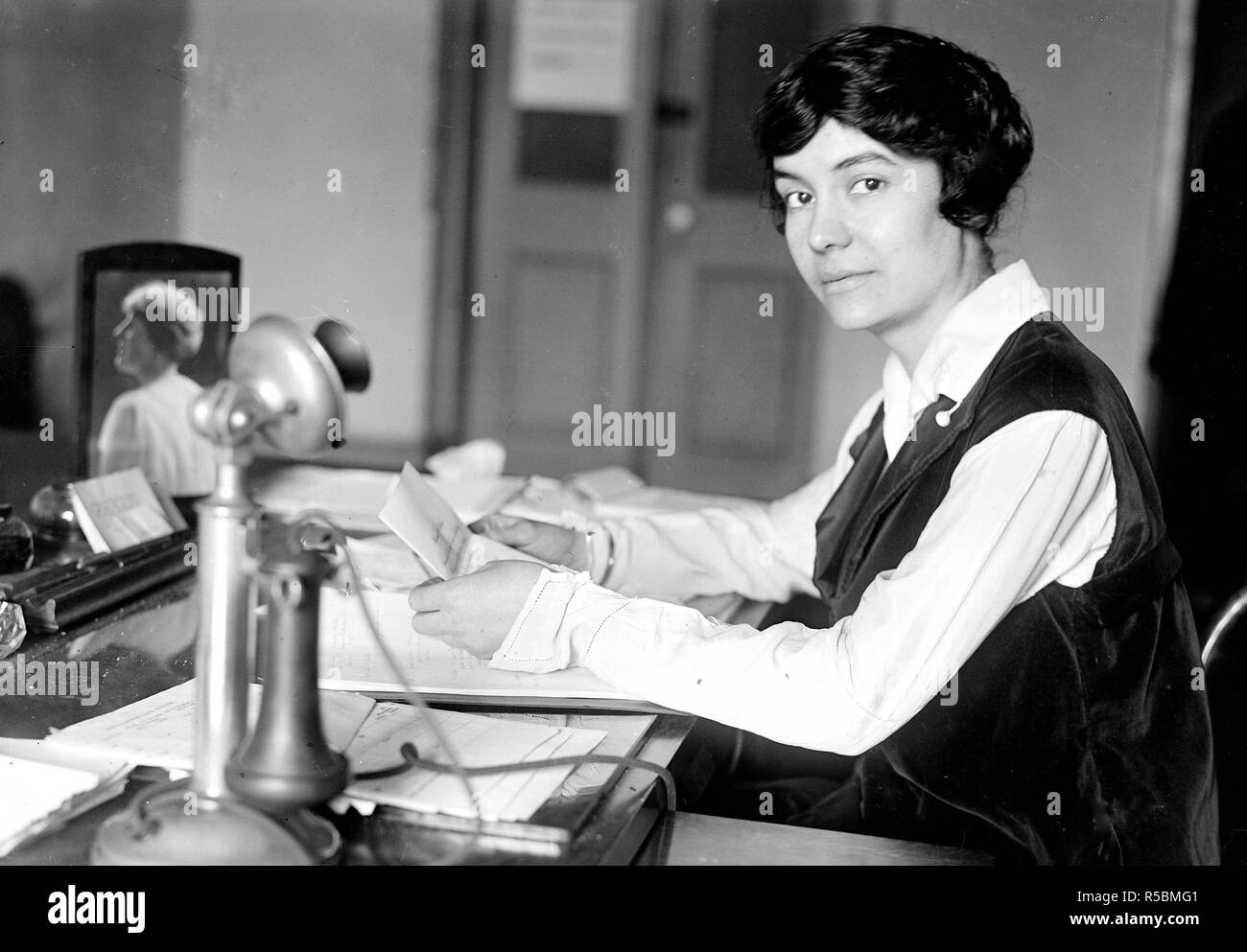Woman working in an office in the early 1900s - ca. 1913-1918 Stock ...