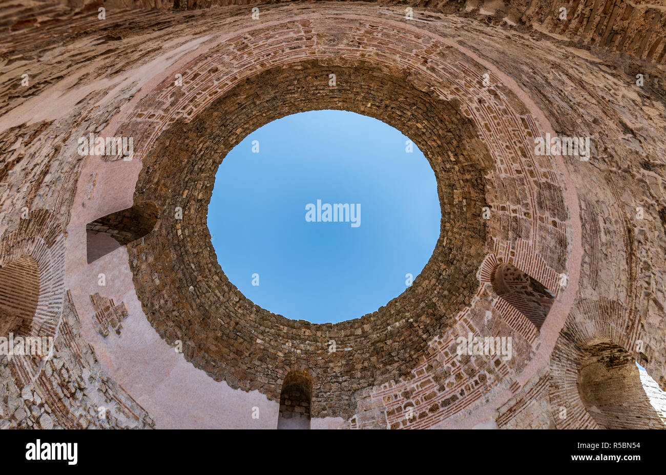 An open antique round roof of a building Stock Photo - Alamy