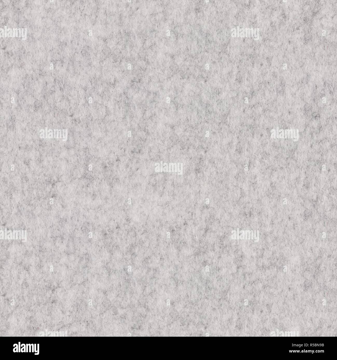 Fragment of grey thick felt material. Seamless square background, tile ...