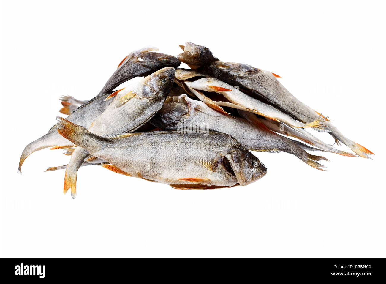 A heap of salty dry river fish bass, perch isolated Stock Photo - Alamy