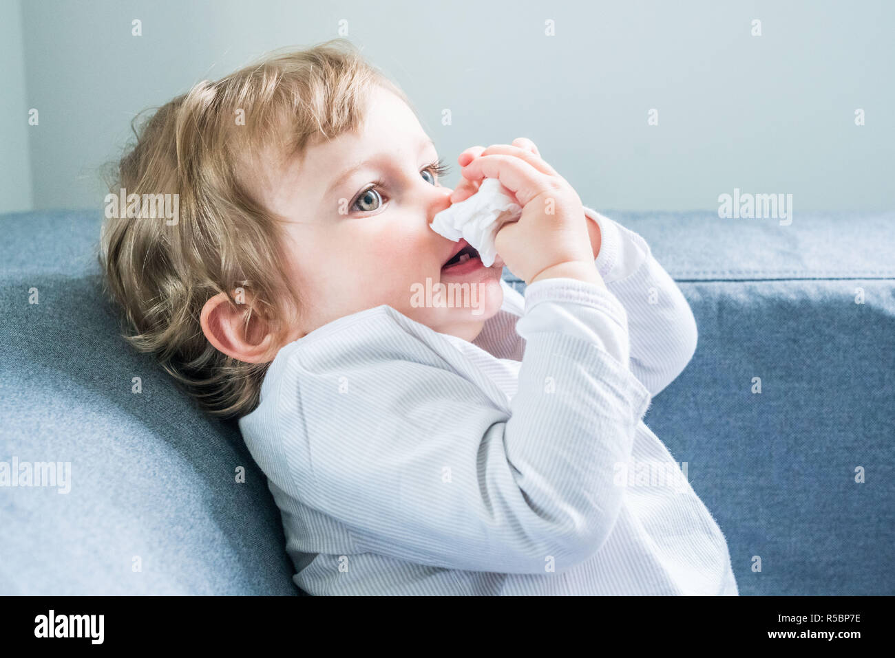 Girl blowing nose tissue paper hi-res stock photography and images - Alamy
