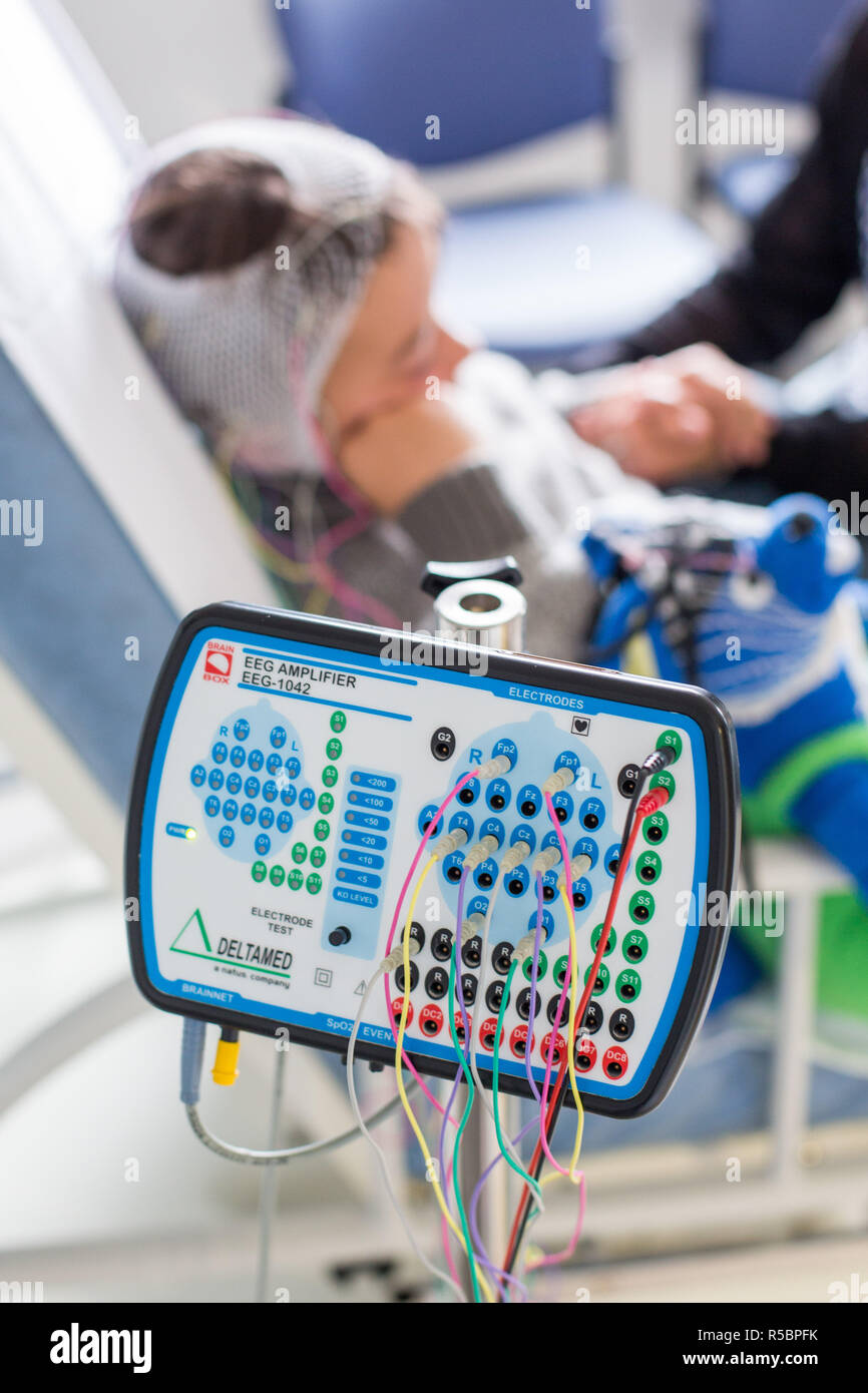 Child undergoing an electroencephalogram (EEG), epilepsy screening ...