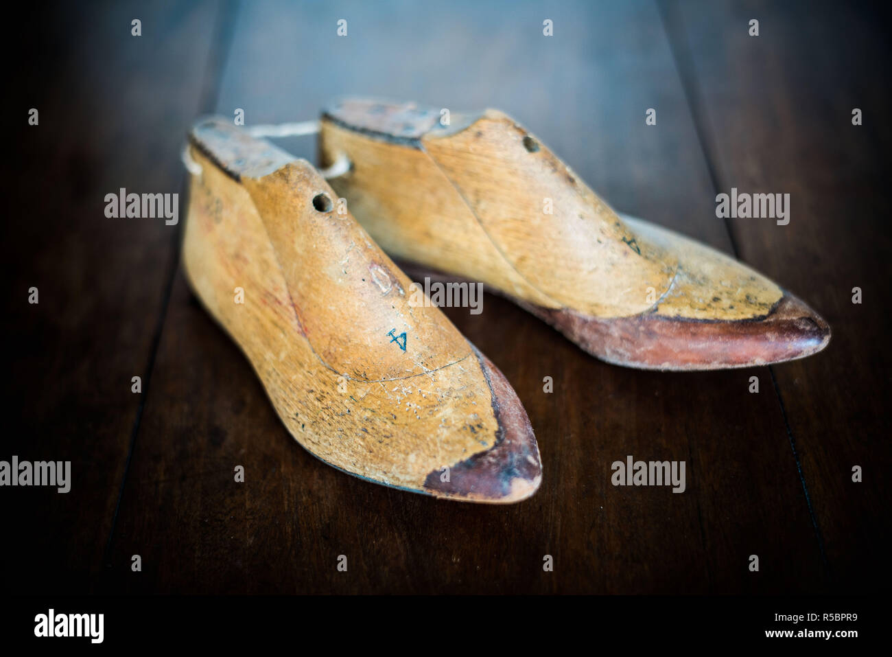 Pair of old wooden shapes to make shoes Stock Photo - Alamy