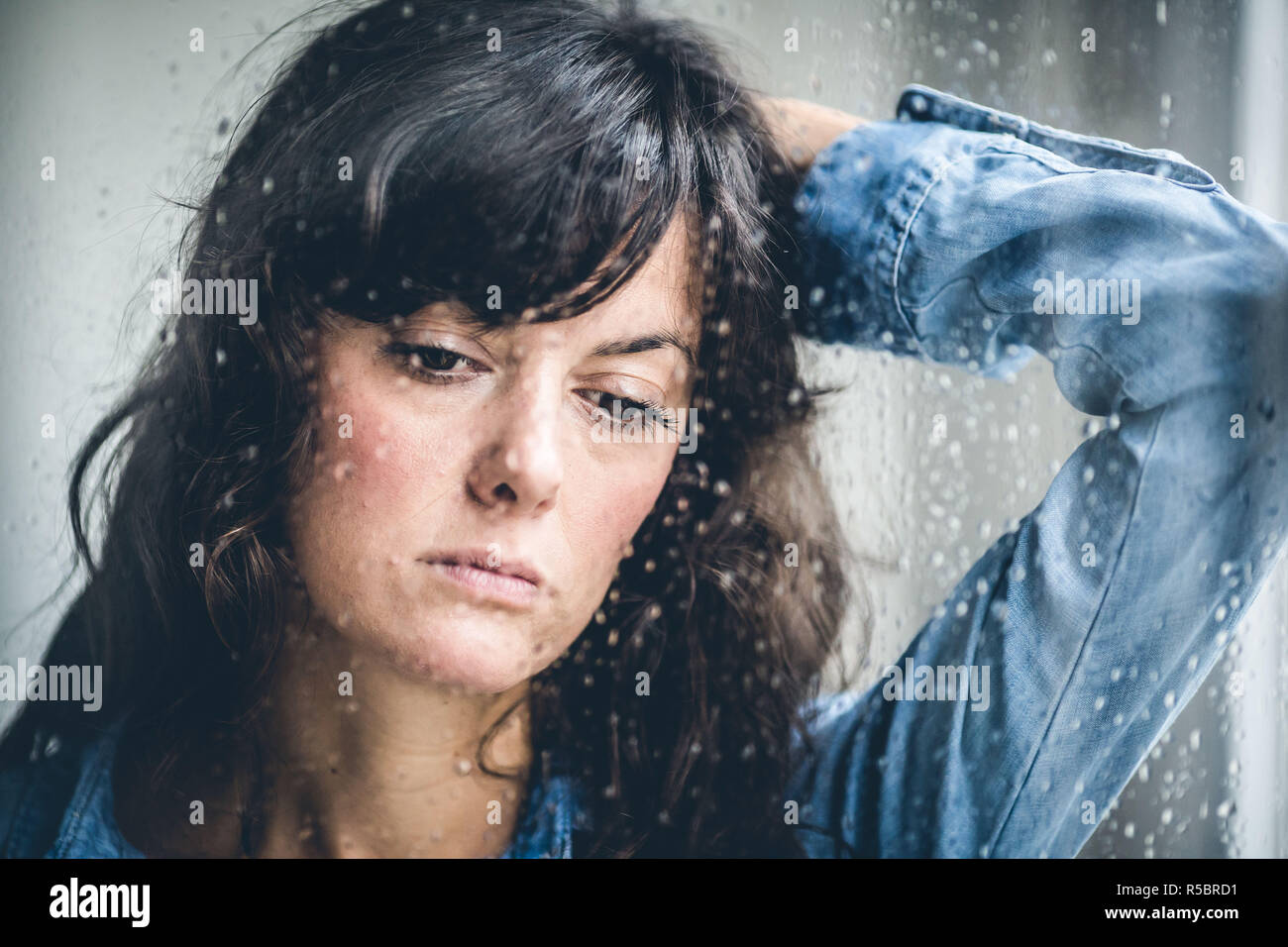 Portrait of sad woman Stock Photo - Alamy