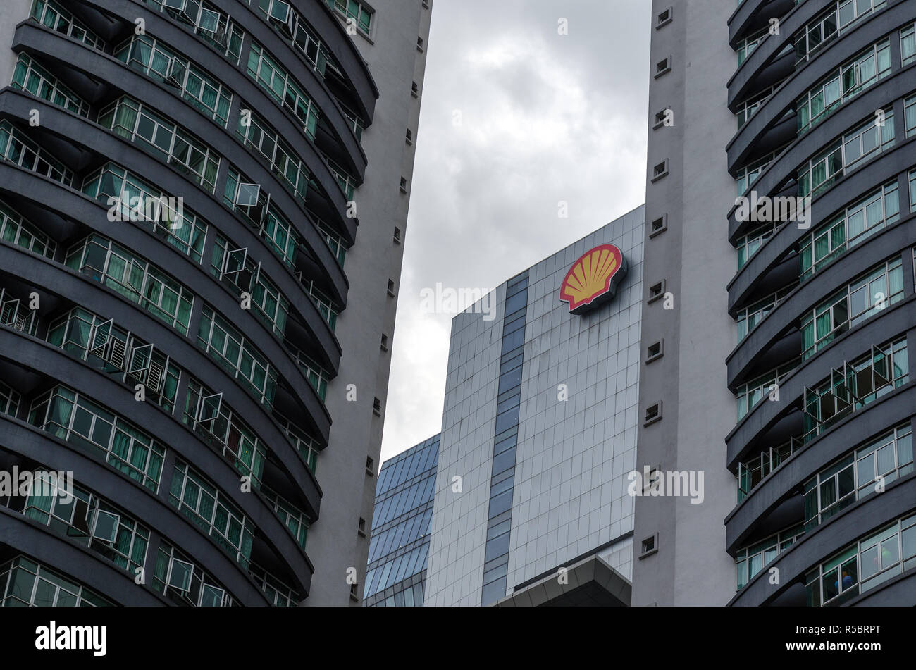 Hong Kong, 2018-02-27: Shell office building, surrounded by skyscrapers ...
