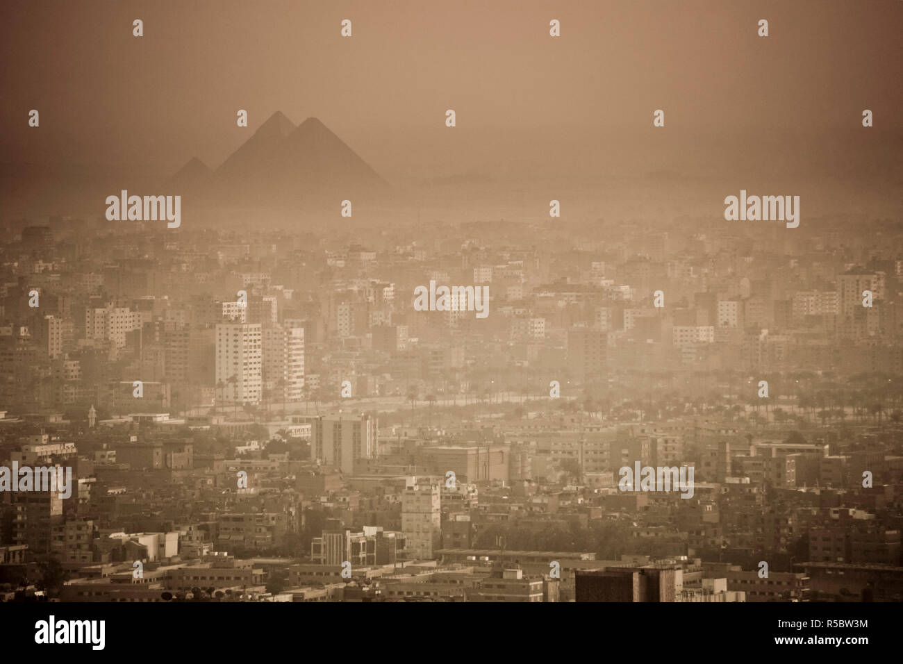 Egypt, Cairo, city skyline and pyramids in the distance, viewed from ...