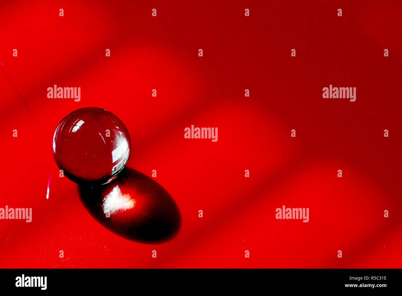 Marbles at close up photo with reflections and shadows Stock Photo - Alamy