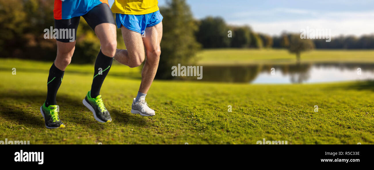 Active lifestyle, runners jogging in nature. Young fit men running in ...
