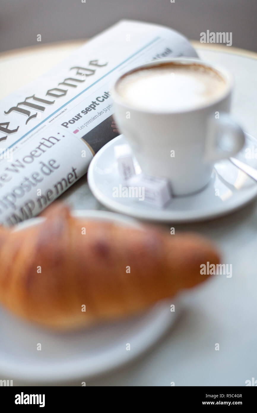 Croissant and coffee in a cafe, Paris, France Stock Photo - Alamy