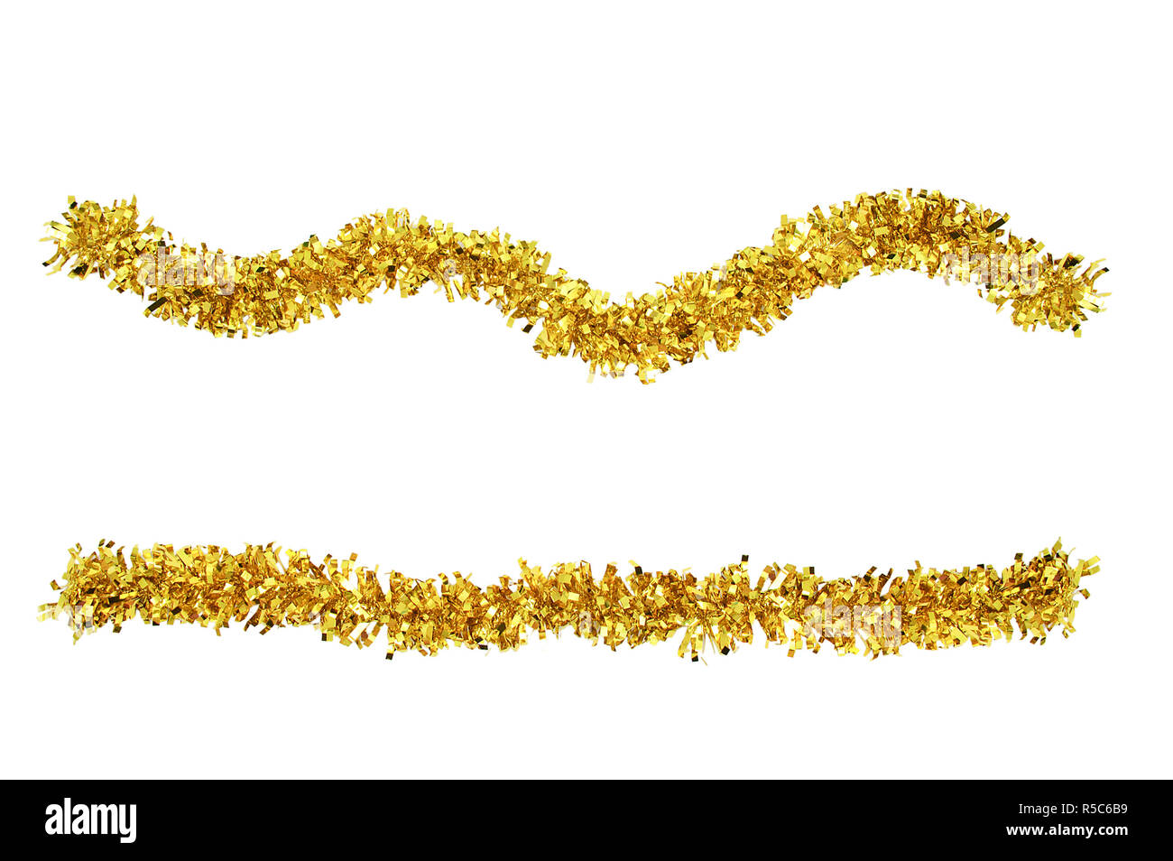 Gold tinsel white background Cut Out Stock Images & Pictures - Alamy