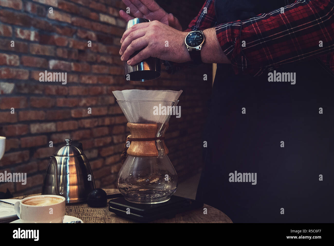 Barista brewing coffee Stock Photo - Alamy