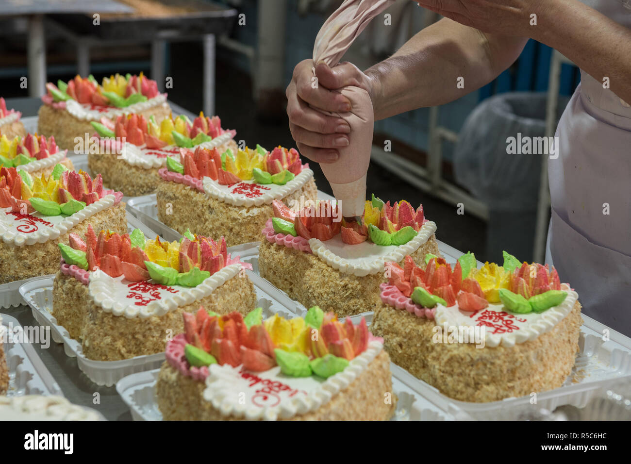 Production line biscuits factory workers hi-res stock photography and ...