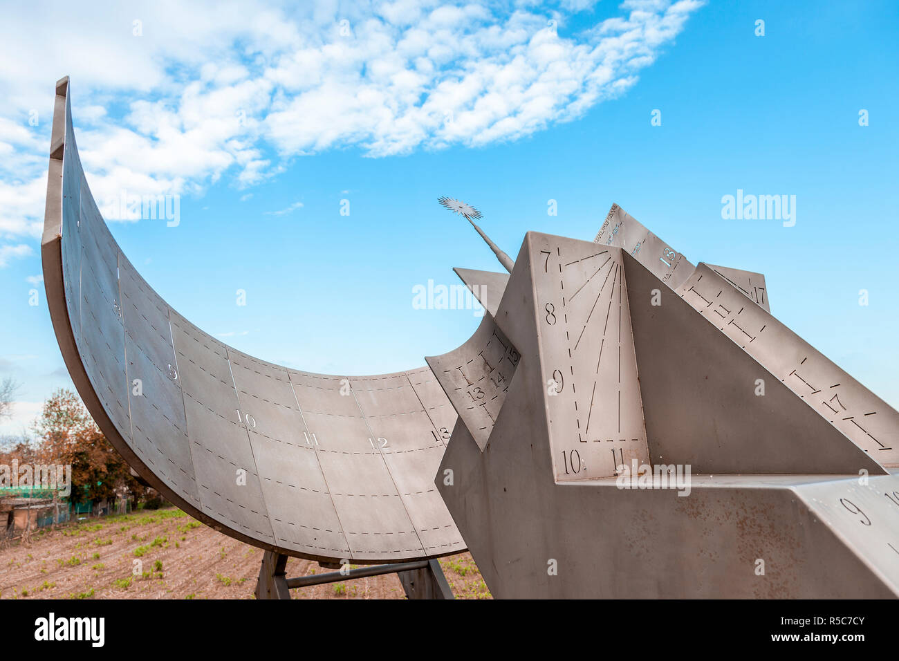 Modern outdoor sundial built in metal in the countryside Stock Photo ...