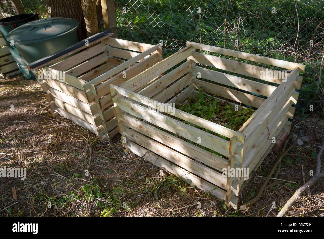 Compost bin as simple wooden silos in the garden, selected focus Stock ...