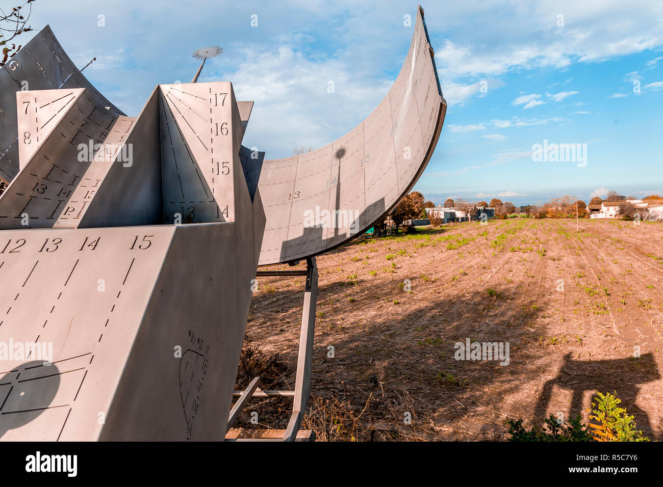 Modern outdoor sundial built in metal in the countryside Stock Photo ...