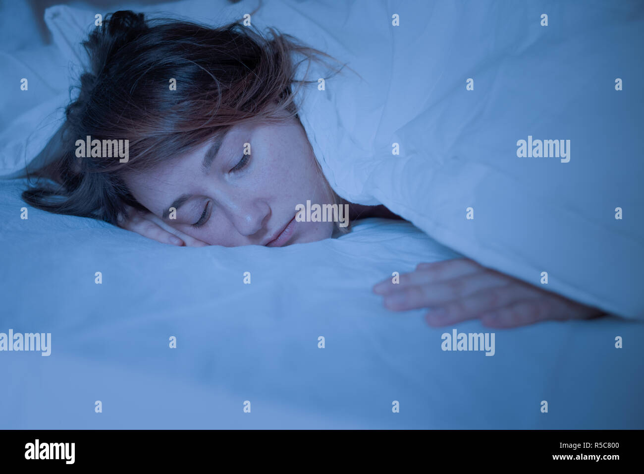 Woman sleep night bed hi-res stock photography and images - Alamy