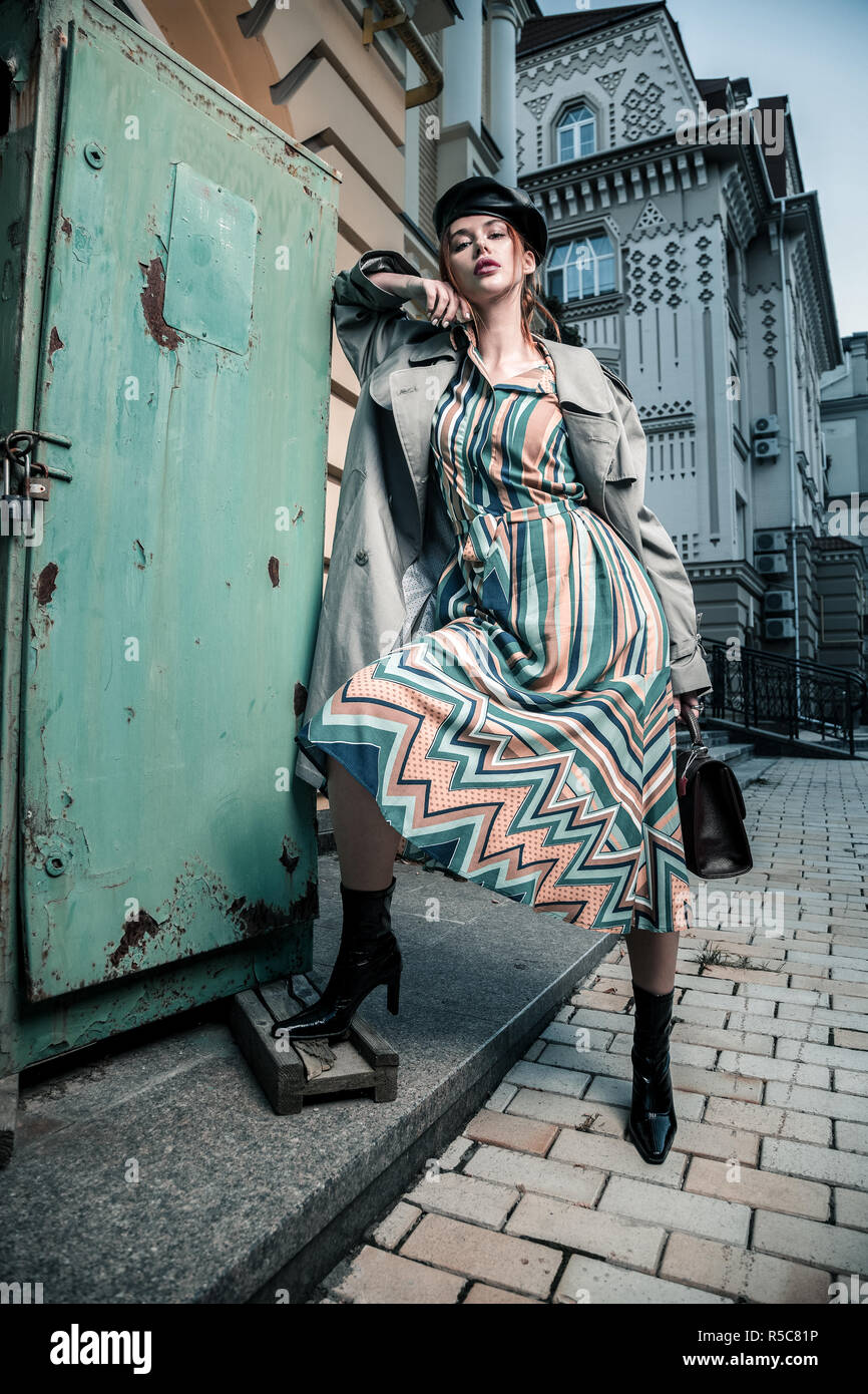 Clothes and accessories. Slim trendy photo model posing in clothes and ...