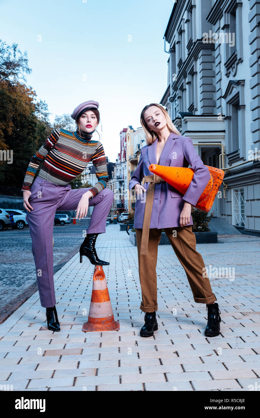 Street style. Professional experienced slim street style models posing ...