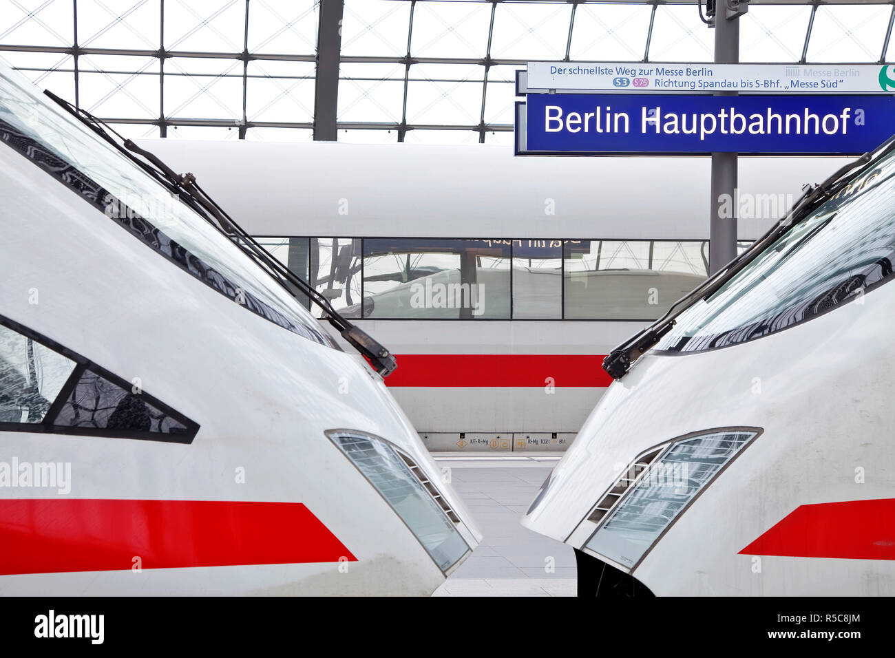 Germany, Berlin, new modern main railway station, train pulling into ...