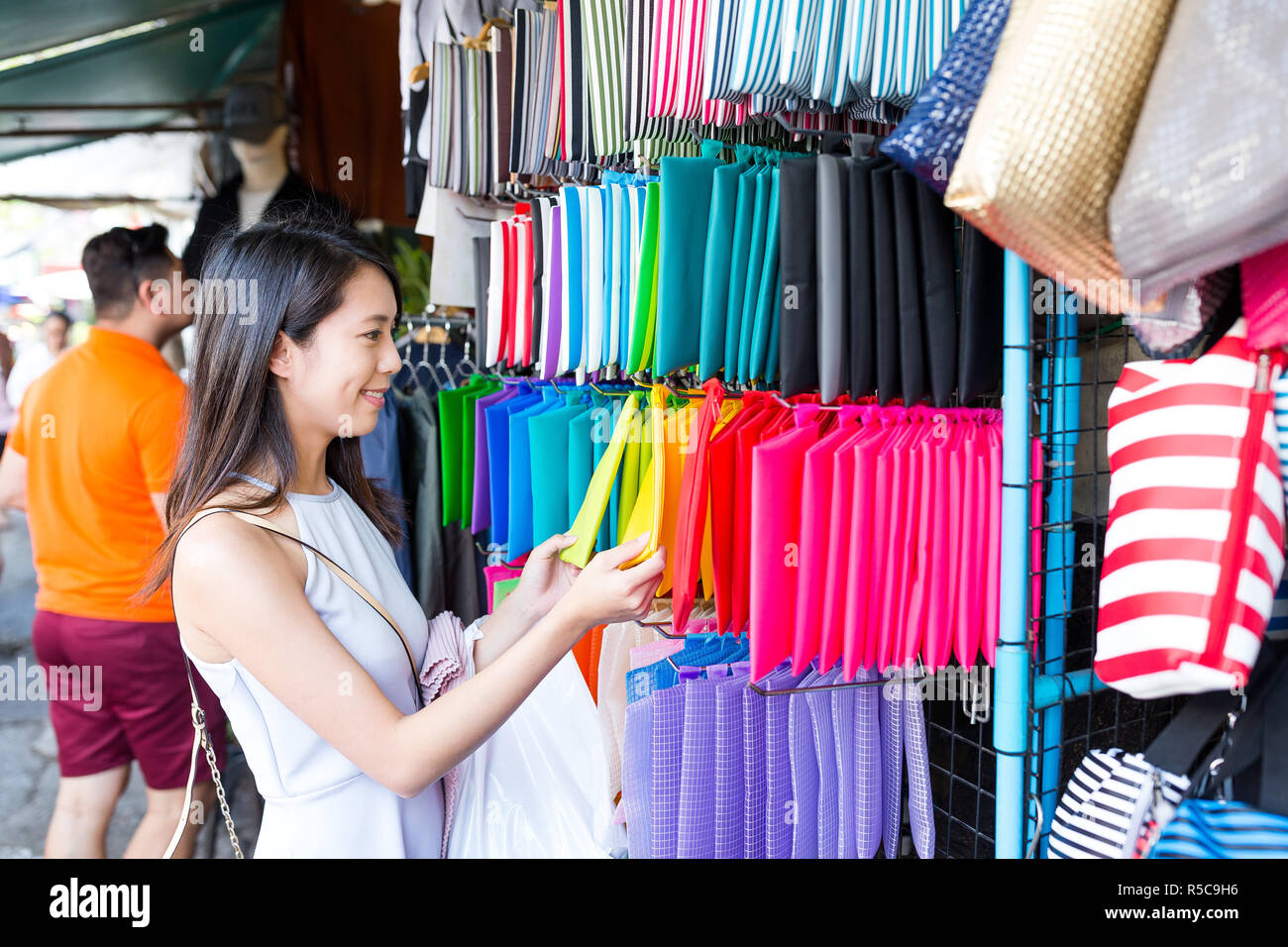 Woman shopping in weekend market Stock Photo - Alamy