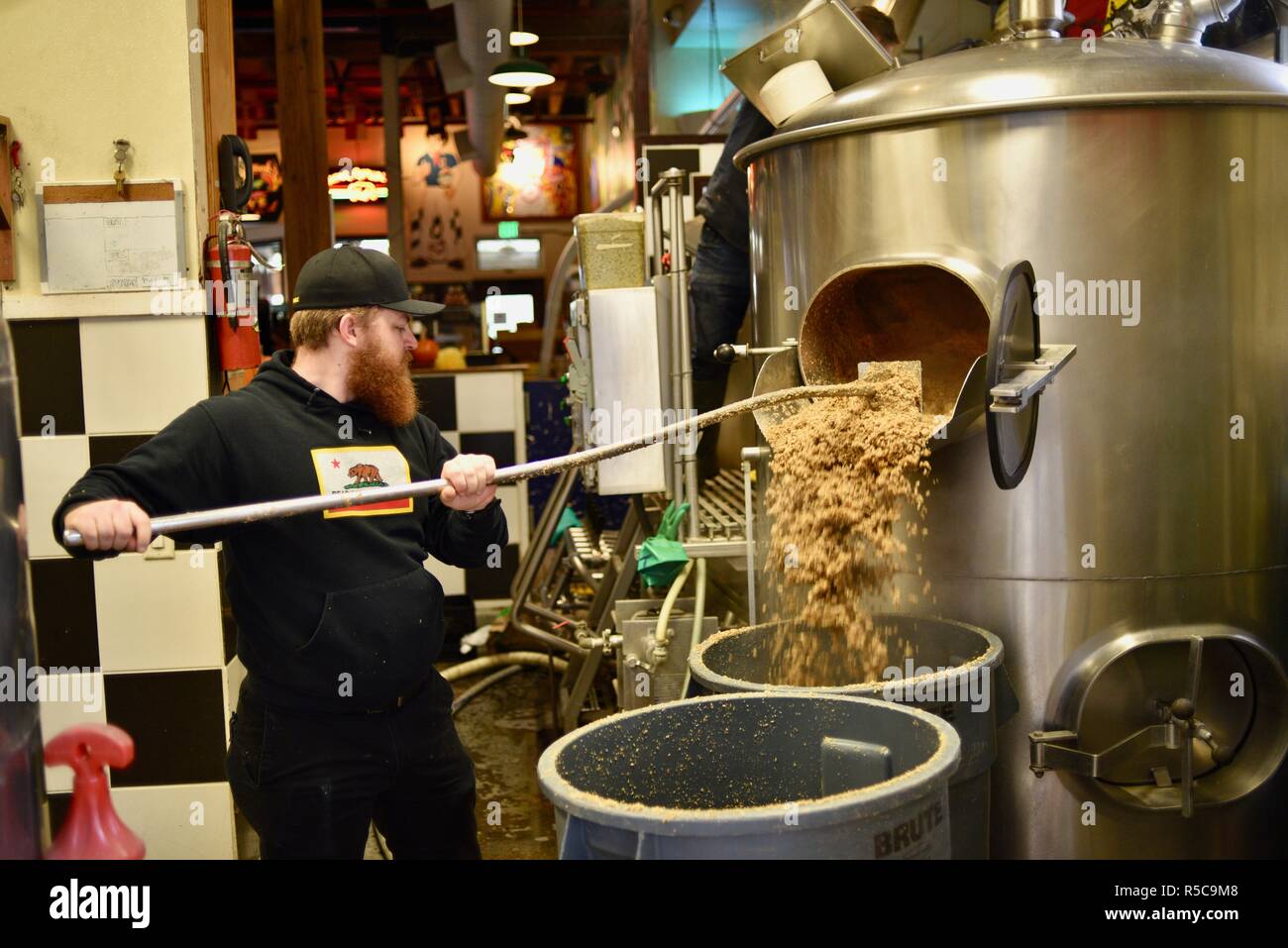 Worker removing mash hi-res stock photography and images - Alamy