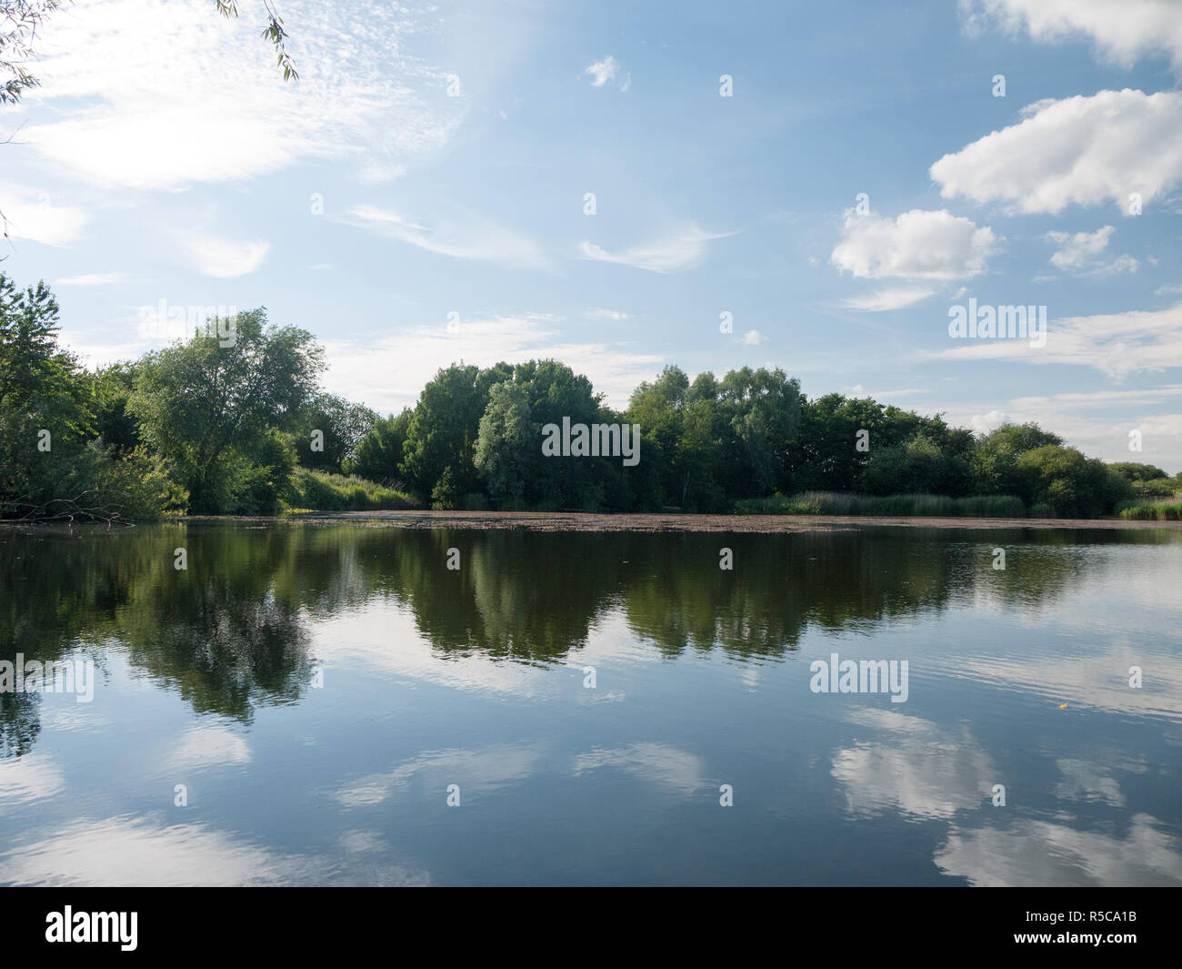 beautiful lake scene on a sunny day in uk Stock Photo - Alamy