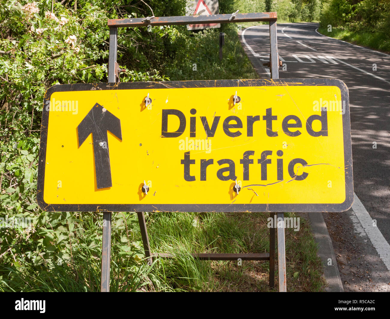 a yellow road traffic construction sign for design graphics saying ...