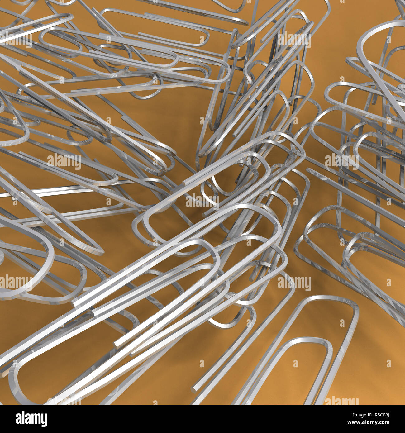office clips scattered on desk Stock Photo - Alamy