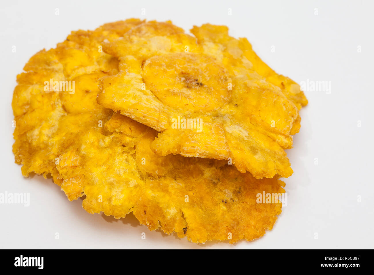 Plantain patacones isolated Stock Photo - Alamy