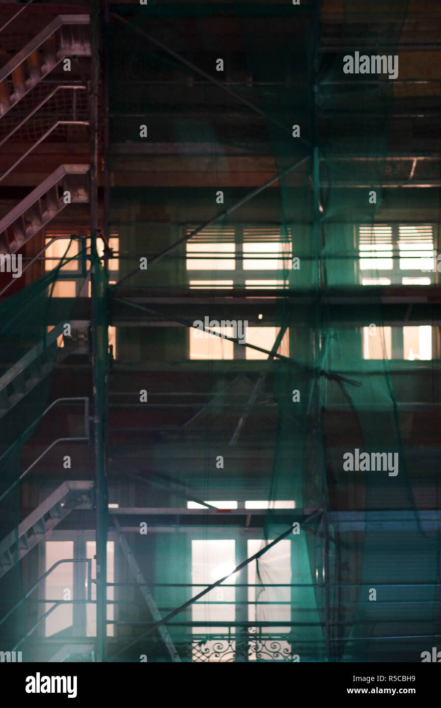 The close-up of a lit scaffolding in the night Stock Photo - Alamy