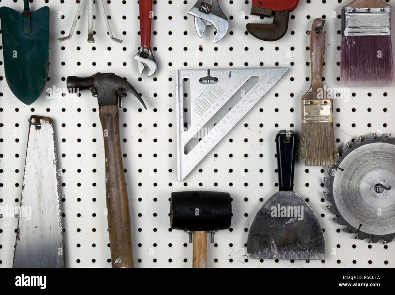 Tools organized in garage Stock Photo - Alamy