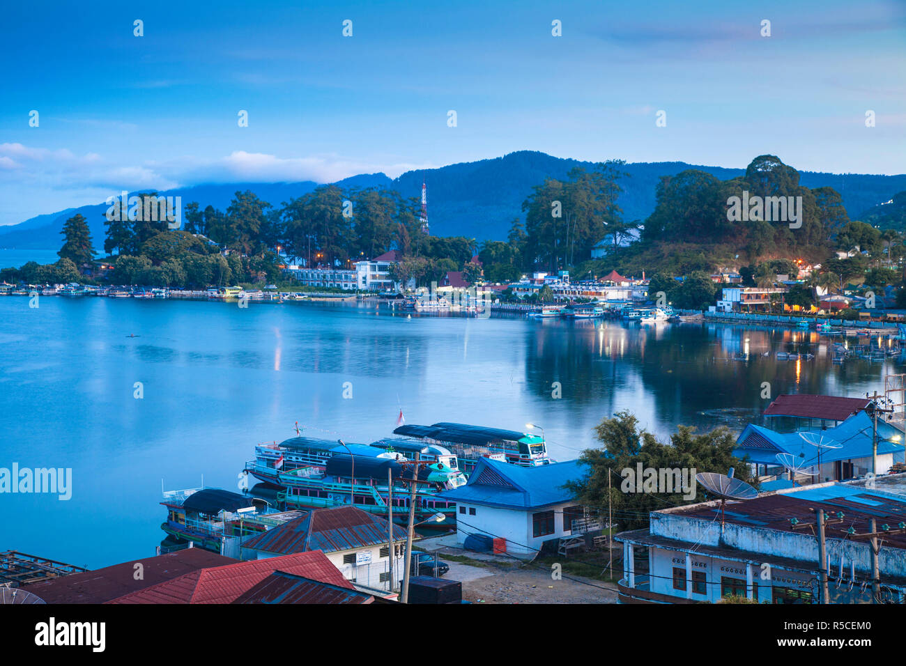 Indonesia, Sumatra, Samosir Island, Lake Toba, View of Parapat at dawn ...