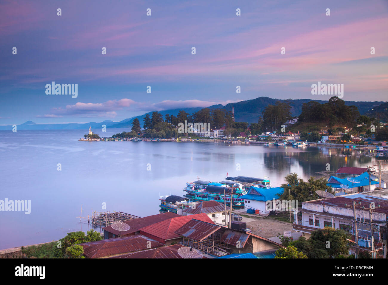Indonesia, Sumatra, Samosir Island, Lake Toba, View of Parapat at dawn ...