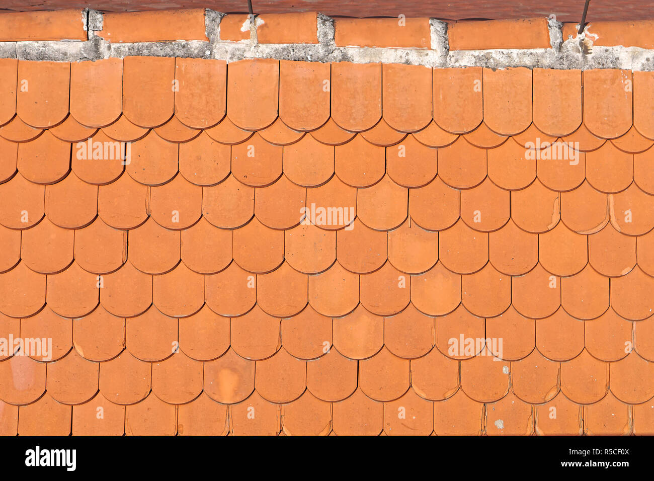 New orange roof tiles background texture Stock Photo - Alamy