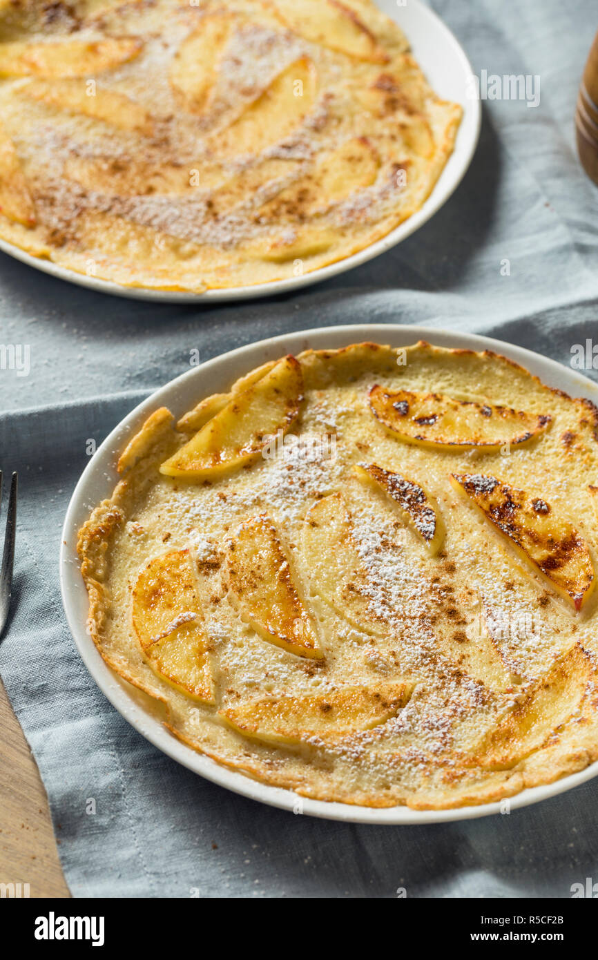 Homemade Apple Dutch Pannekoek Pancake with Powdered Sugar Stock Photo ...