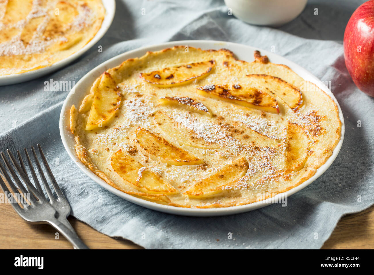 Homemade Apple Dutch Pannekoek Pancake with Powdered Sugar Stock Photo ...