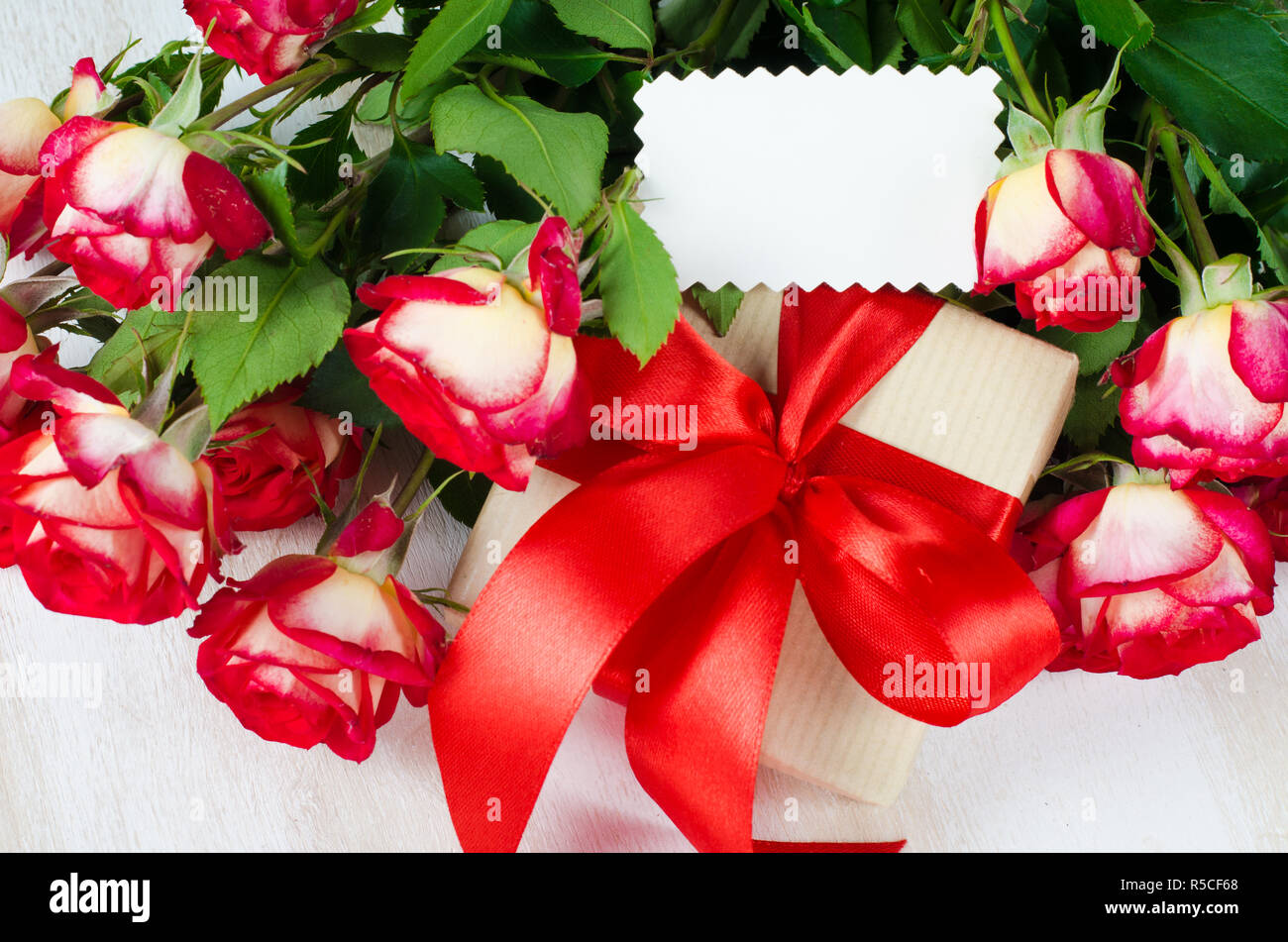 Empty greeting card with copy space for your own text. Red roses and ...