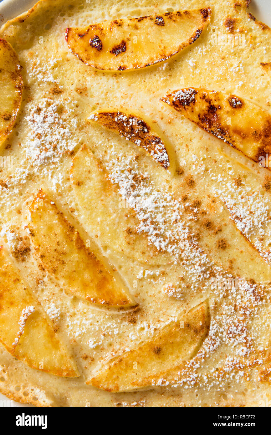 Homemade Apple Dutch Pannekoek Pancake with Powdered Sugar Stock Photo ...