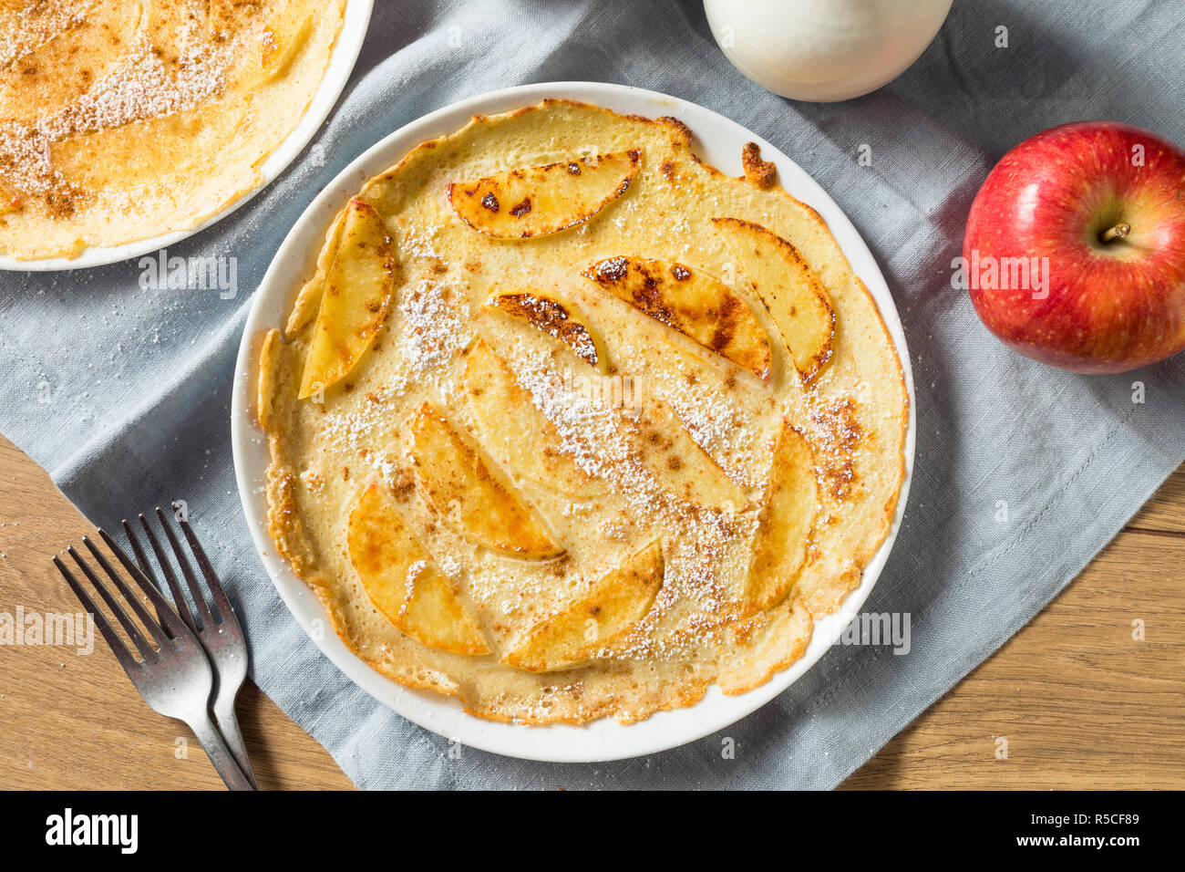 Homemade Apple Dutch Pannekoek Pancake with Powdered Sugar Stock Photo ...