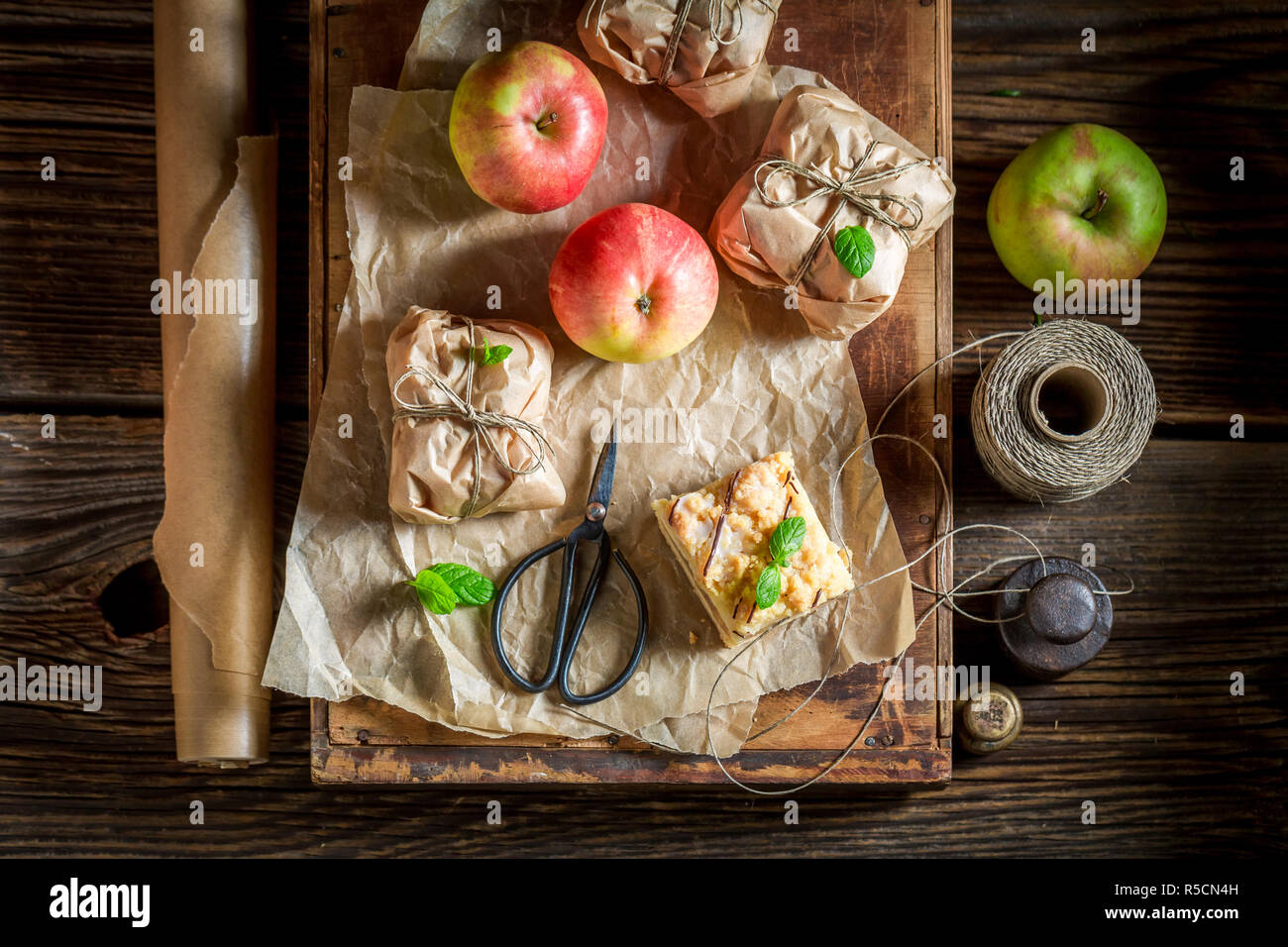 Homemade take away apple pie with crumble and mint Stock Photo - Alamy
