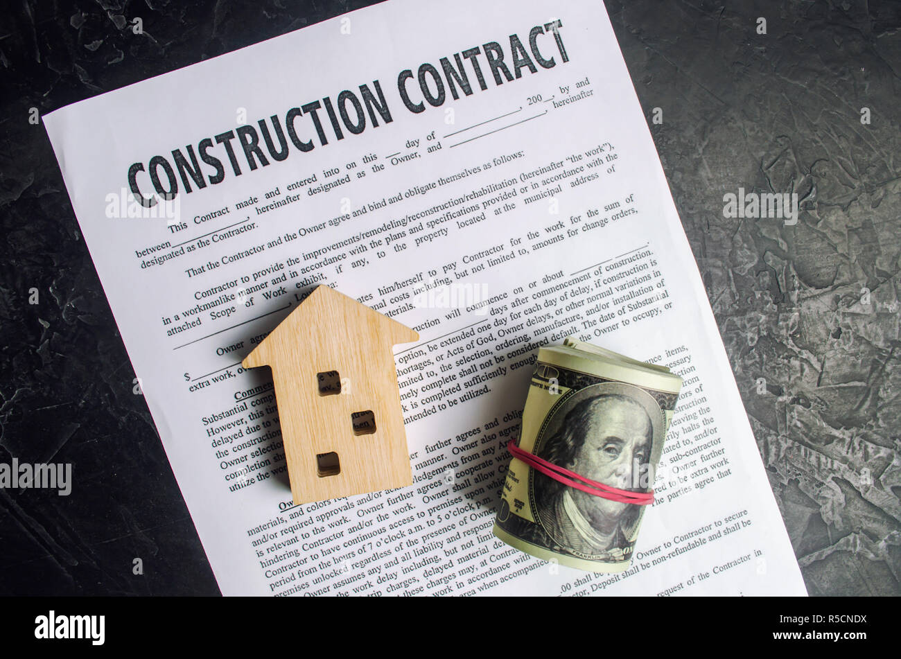 construction contract and house. concept of real estate and planning of ...