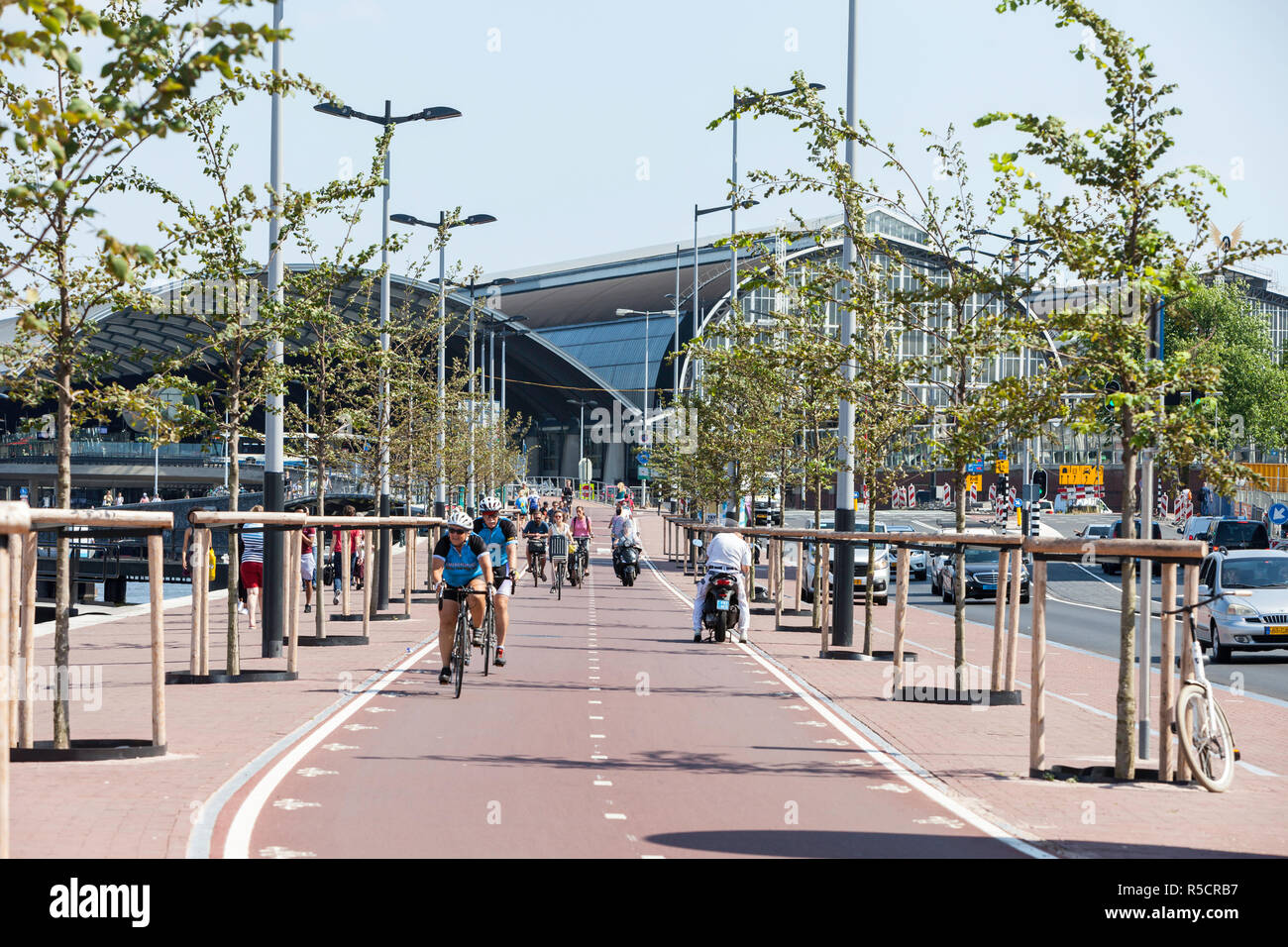 Amsterdam, The Netherlands. Commuters Using Bicycle Lane for Riding ...