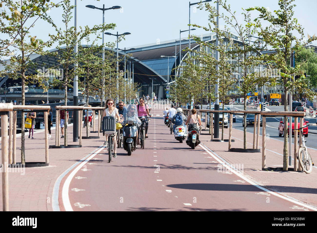 Amsterdam, The Netherlands. Commuters Using Bicycle Lane for Riding ...