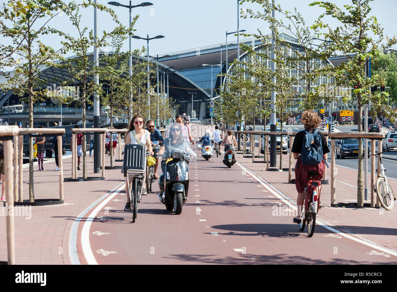 Amsterdam, The Netherlands. Commuters Using Bicycle Lane for Riding ...