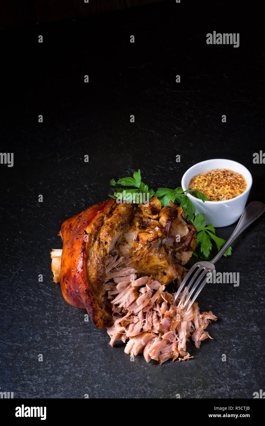 Roasted lamb knuckle served hi-res stock photography and images - Alamy