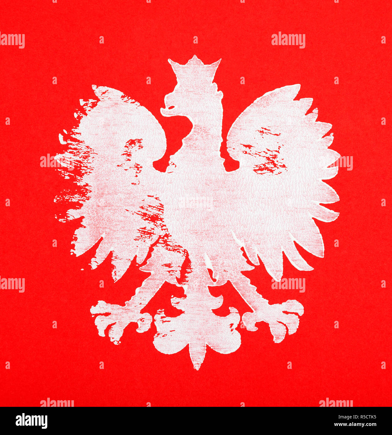 Painted polish coat of arms on red background Stock Photo - Alamy