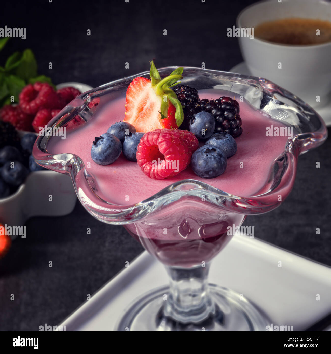 delicious pudding with wild berry Stock Photo - Alamy