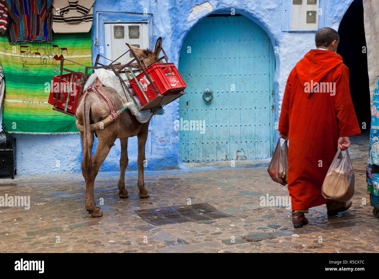 Man carrying donkey hi-res stock photography and images - Alamy