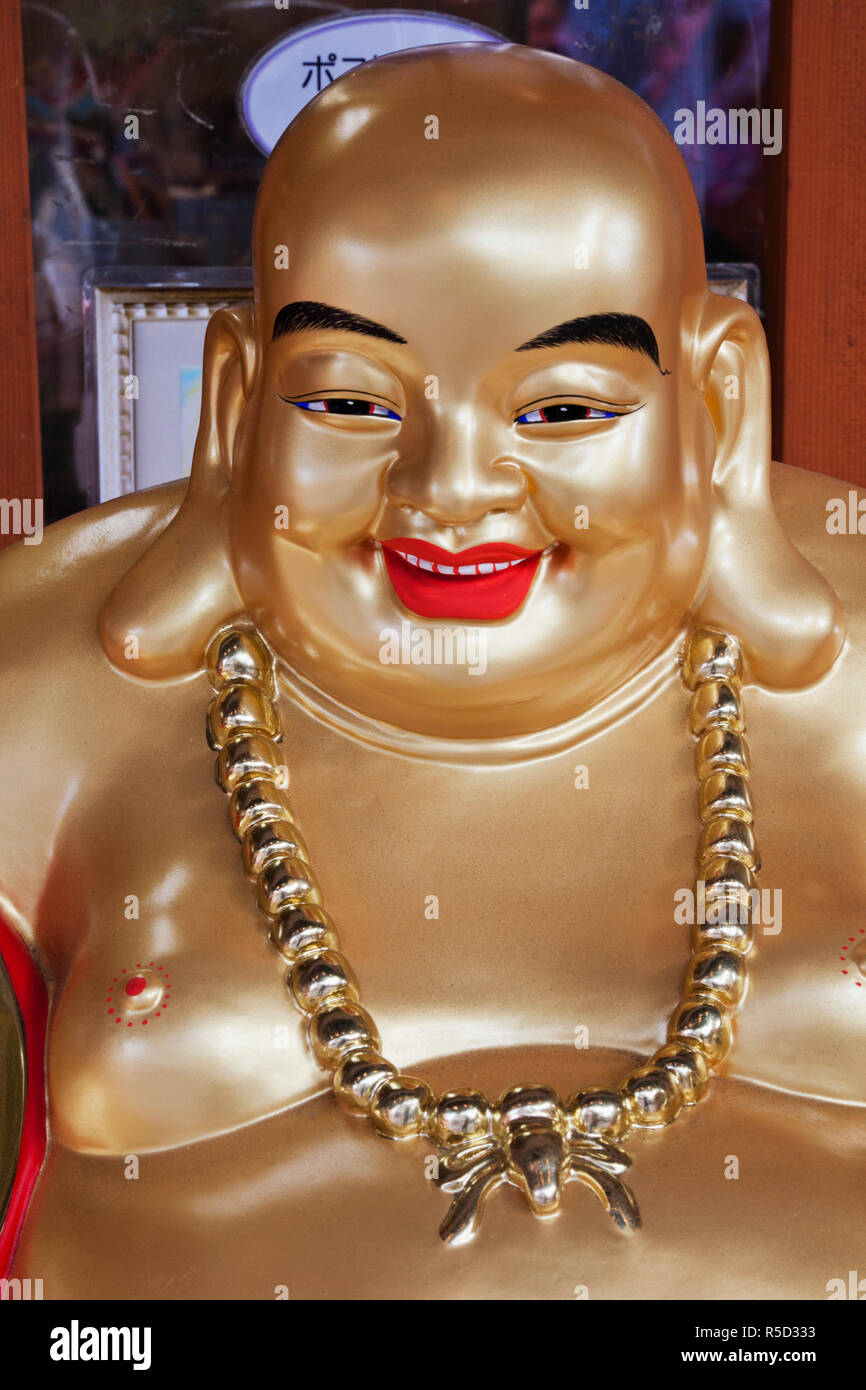 Japan laughing statue hi-res stock photography and images - Alamy