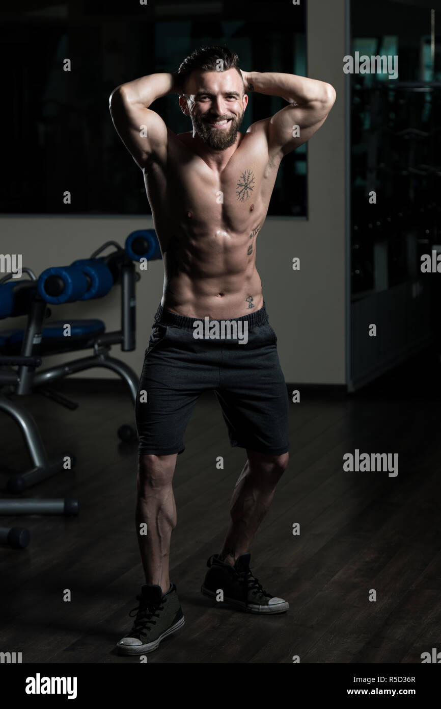 Portrait Of A Young Physically Fit Man Showing His Well Trained Body ...